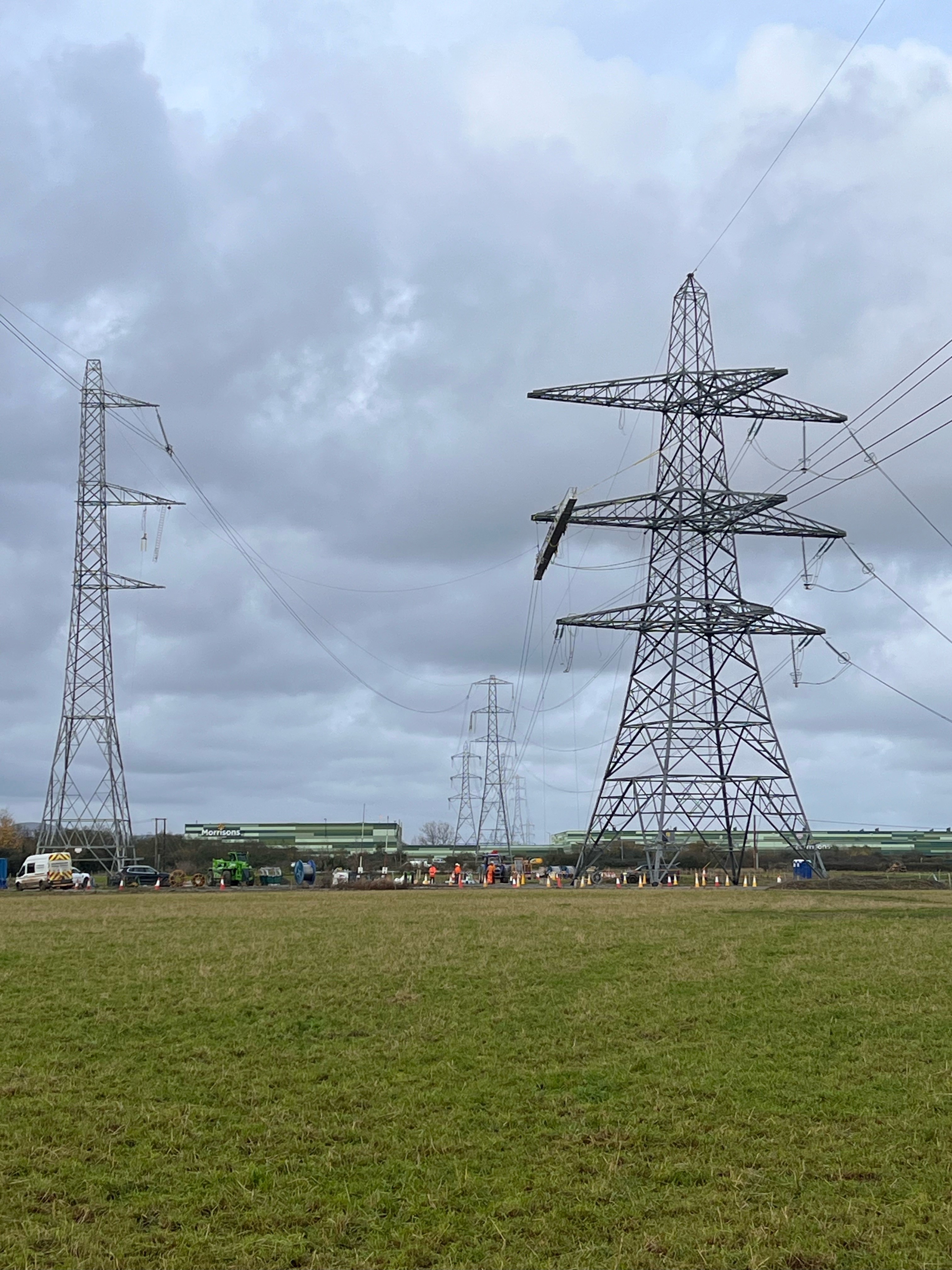 Diverted overhead line transferred back to permanent location near ...
